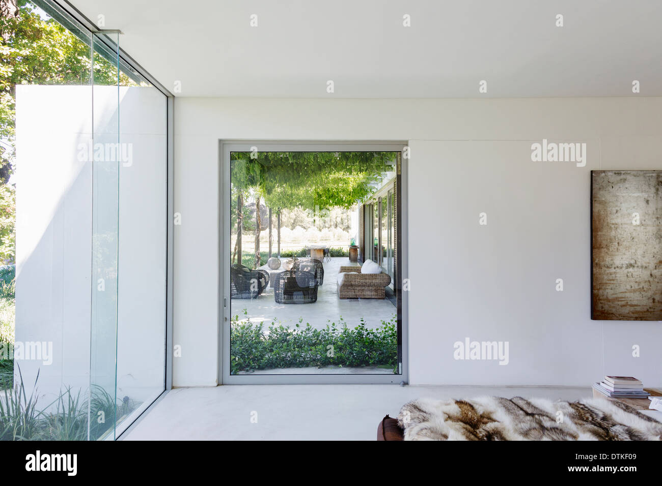 Bedroom window overlooking luxury garden patio Stock Photo - Alamy