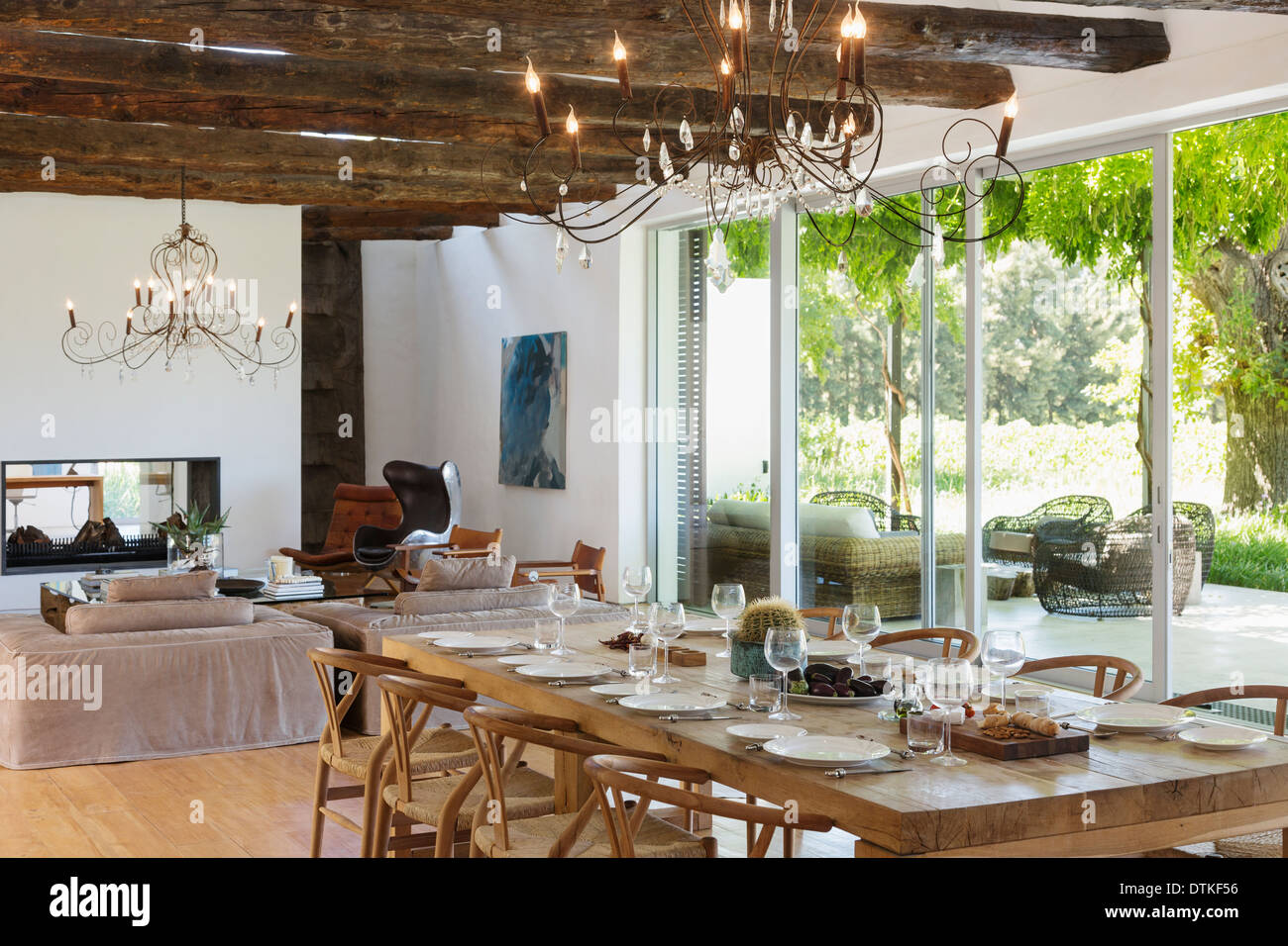 Dining room overlooking patio Stock Photo - Alamy
