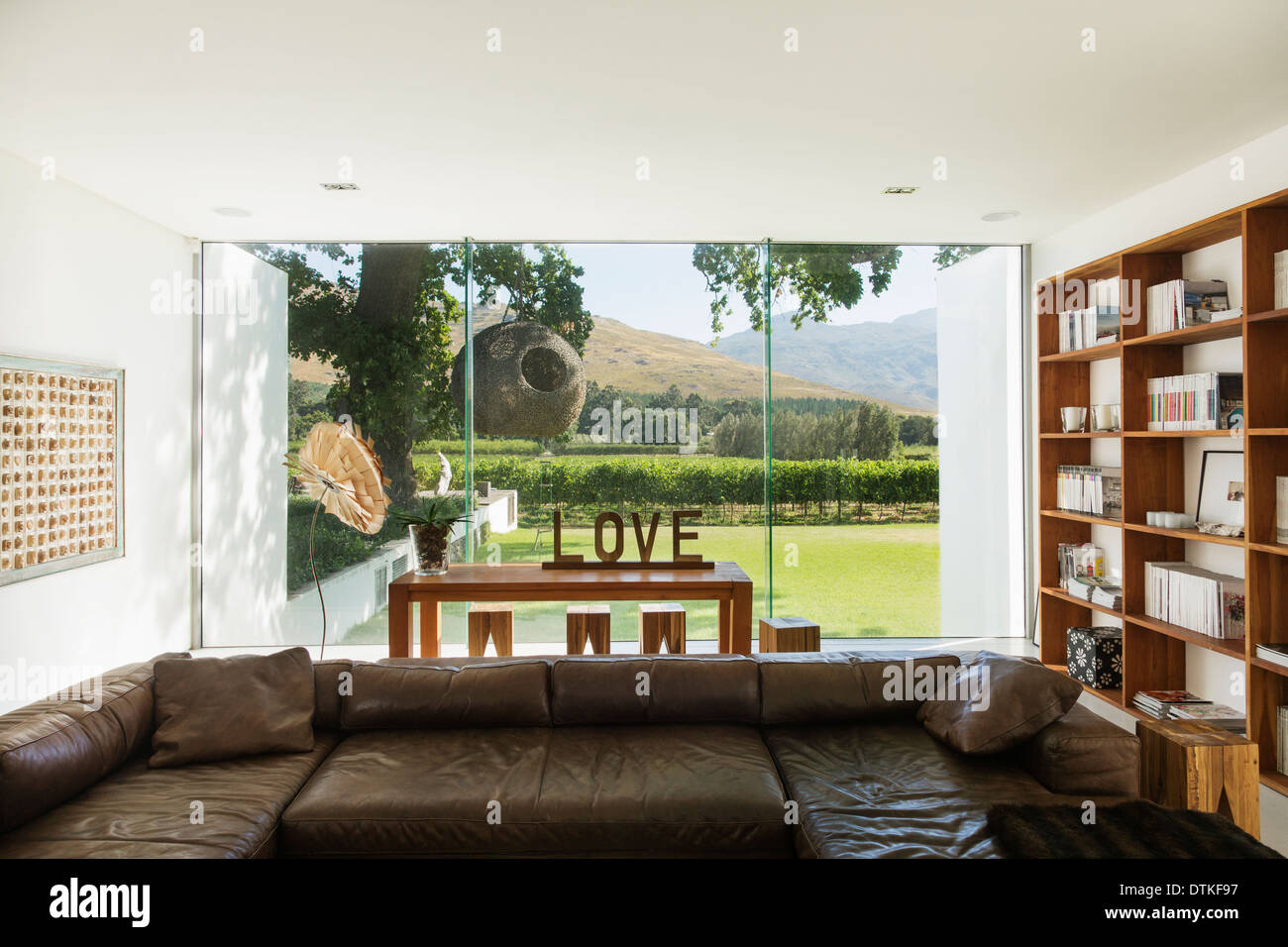 Living room overlooking garden Stock Photo - Alamy