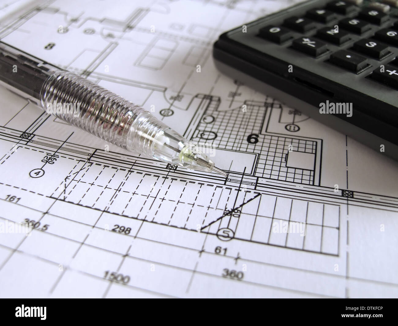 Pencil and calculator on the architectural project Stock Photo - Alamy