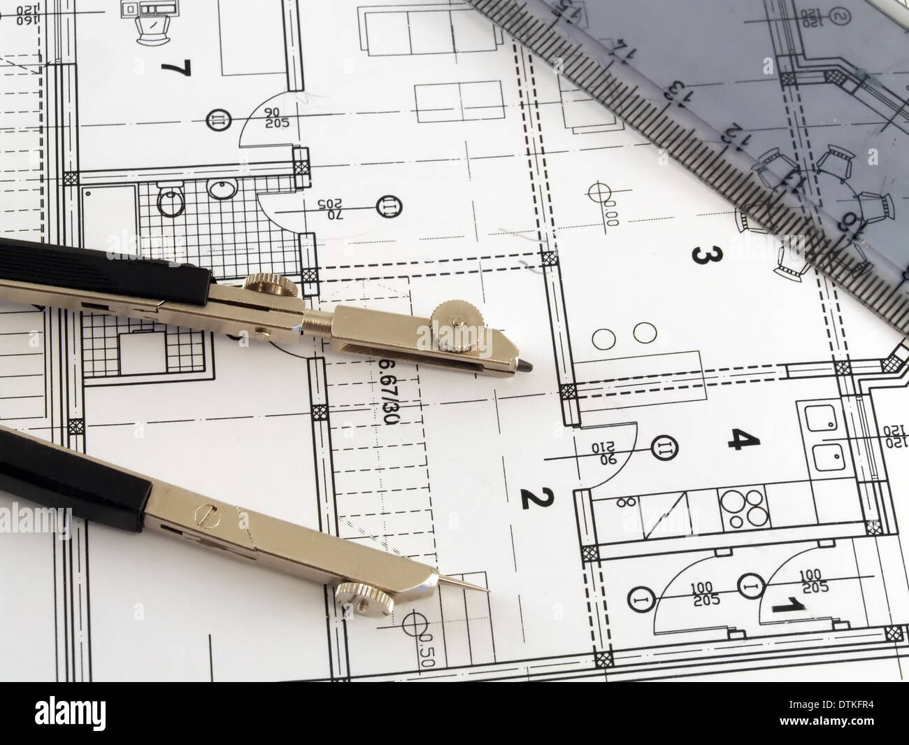 dividers and ruler laying on architectural plan Stock Photo - Alamy