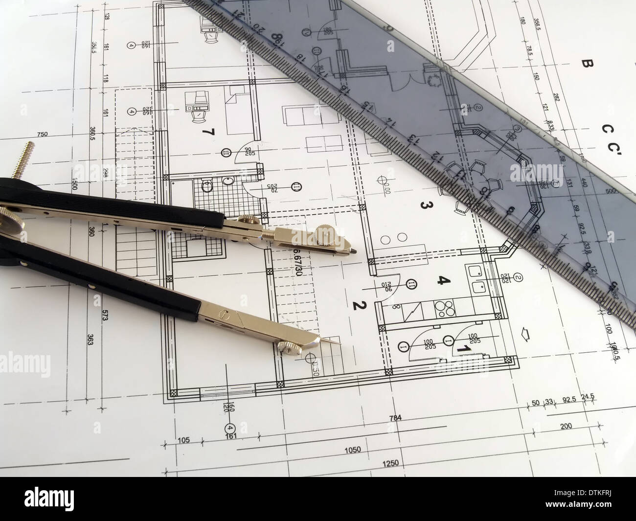 dividers and ruler laying on architectural plan Stock Photo - Alamy