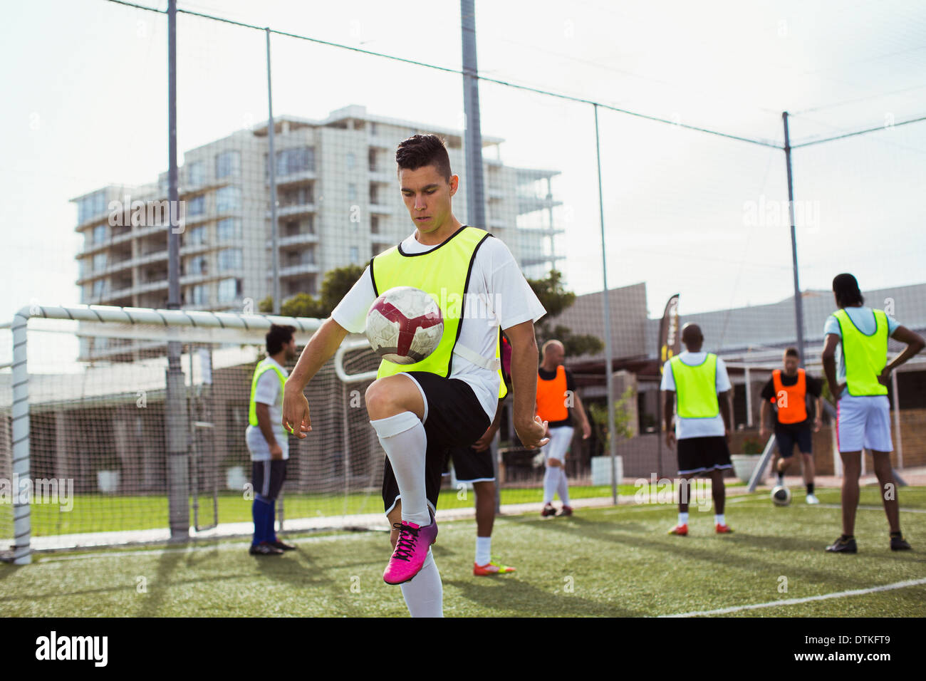 Soccer player training on field Stock Photo - Alamy