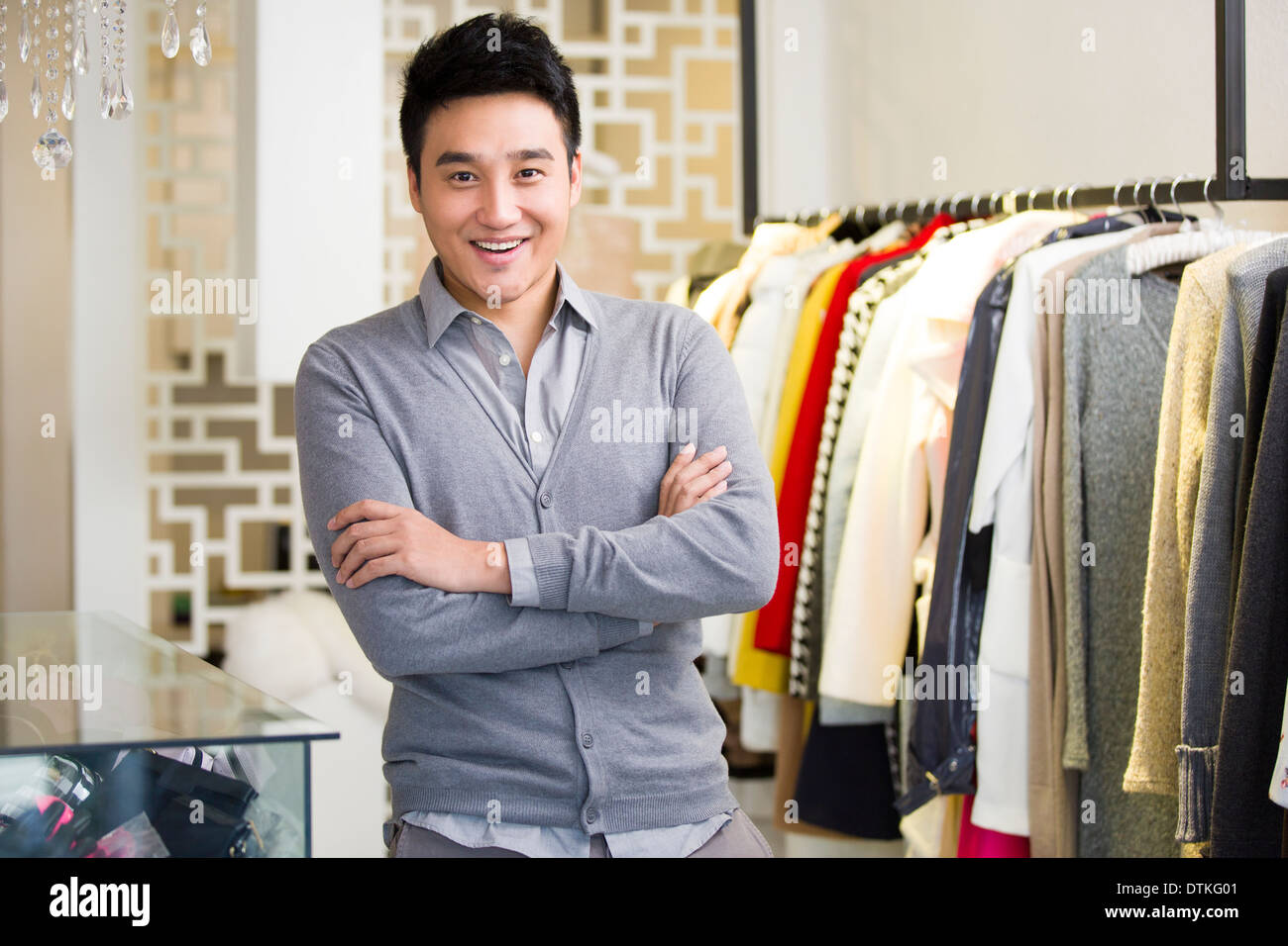 Clothing store owner Stock Photo - Alamy