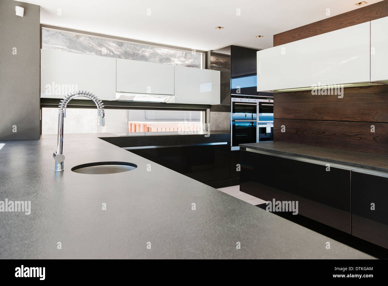 Sink and counters in modern kitchen Stock Photo - Alamy