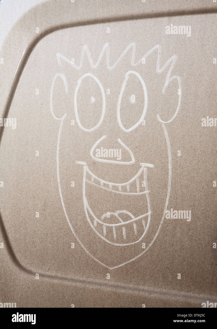 Funny face drawn in dirt on white van, UK Stock Photo - Alamy