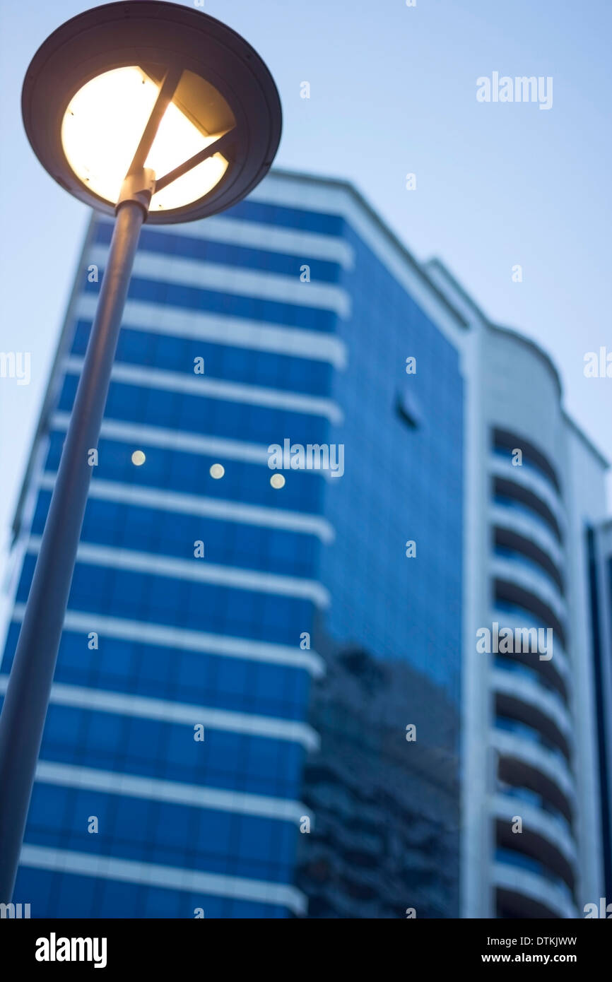 Corporate Building and street light in the night Stock Photo - Alamy