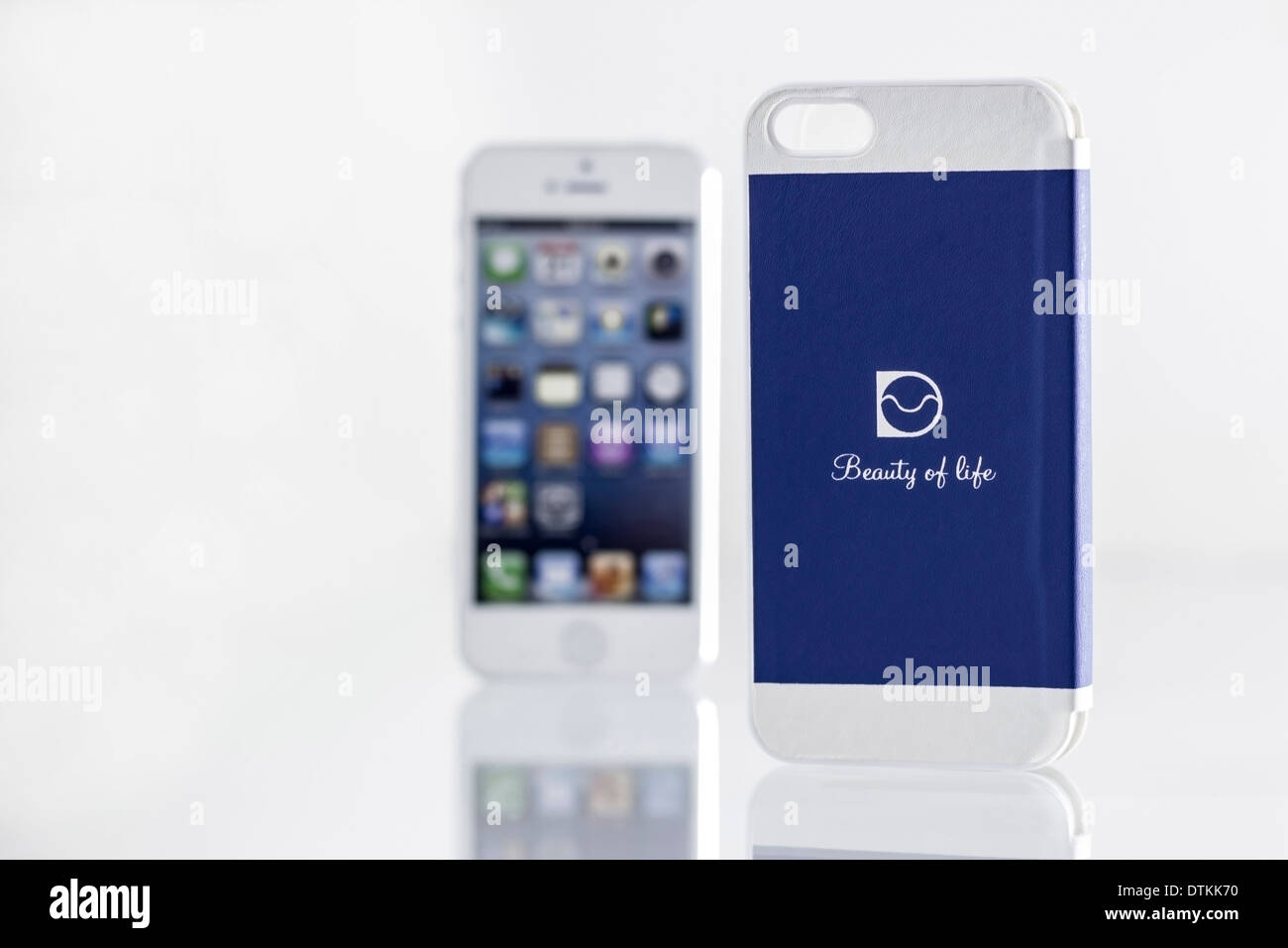 stylish mobile phone and its bright blue cover Stock Photo - Alamy