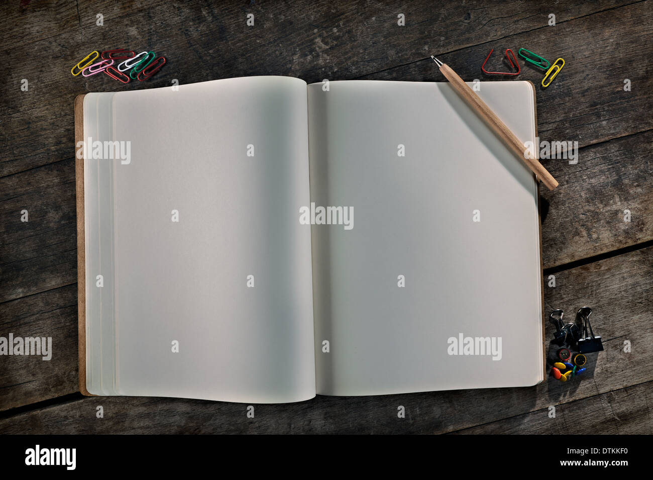 Blank notebook with pencil and paper clips, it can be easily customized ...