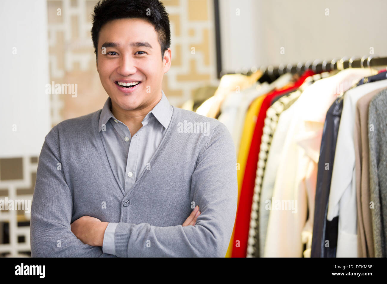 Clothing store owner Stock Photo - Alamy
