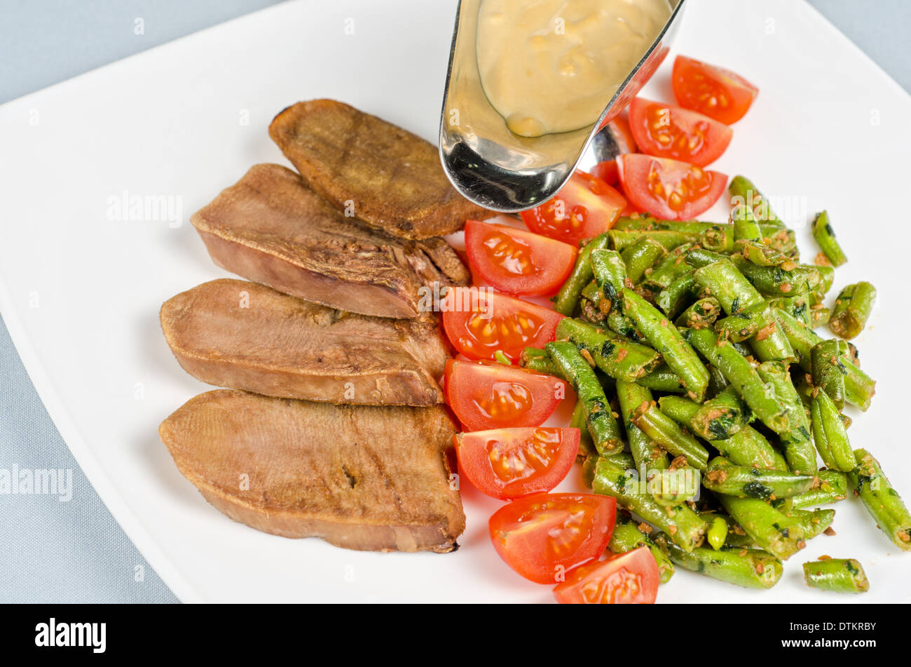 grilled beef tongue Stock Photo - Alamy