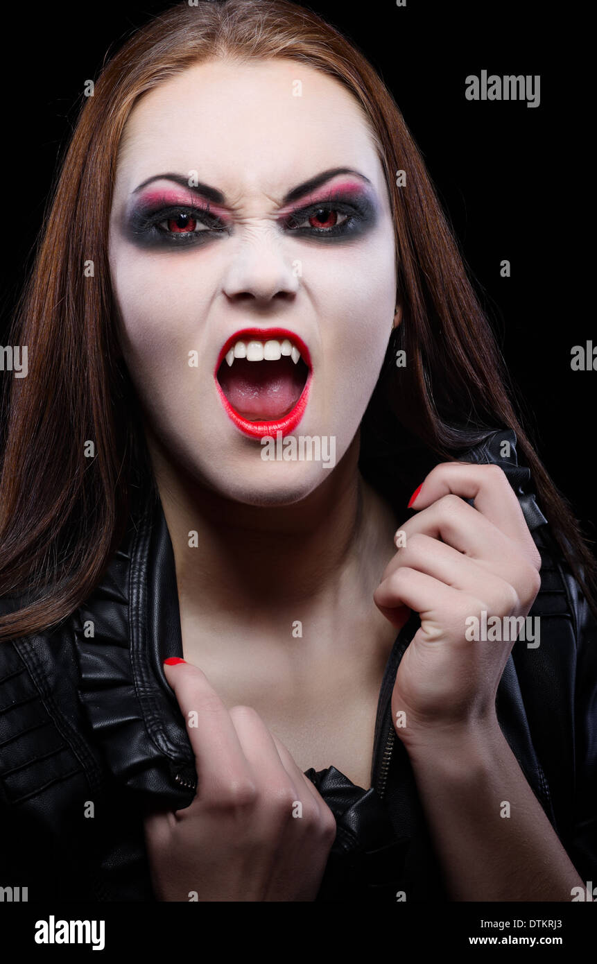 Young beautiful vampire woman isolated Stock Photo - Alamy