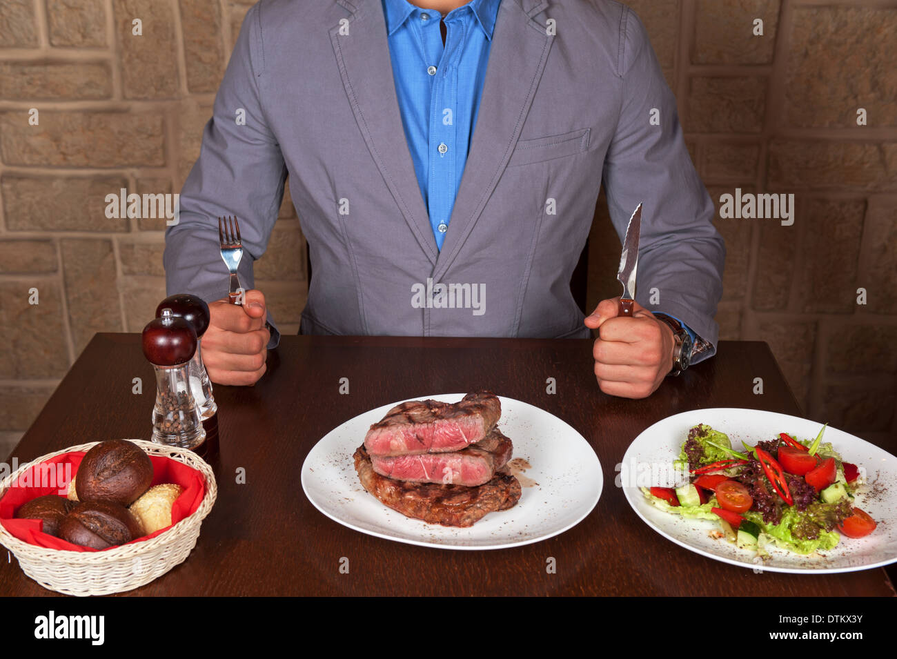 eat a beef steak Stock Photo - Alamy
