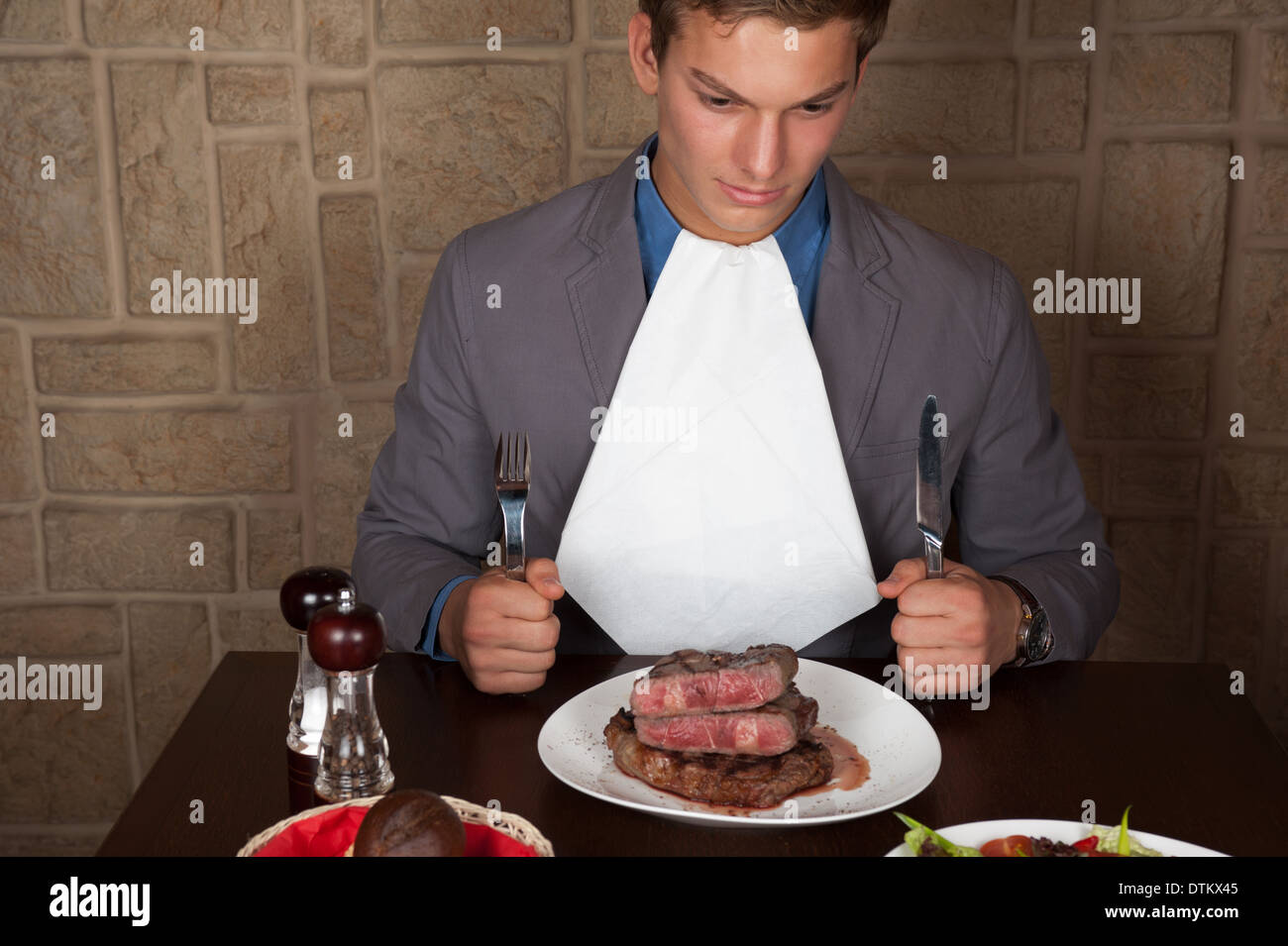 eat a beef steak Stock Photo - Alamy