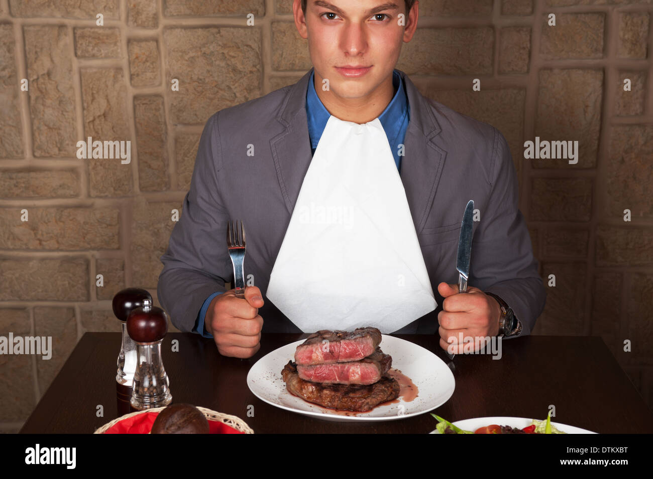 Big steak fork and hand hi-res stock photography and images - Alamy