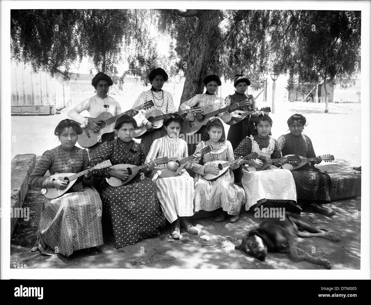 This photograph shows a school girl mandolin orchestra at the Mission ...