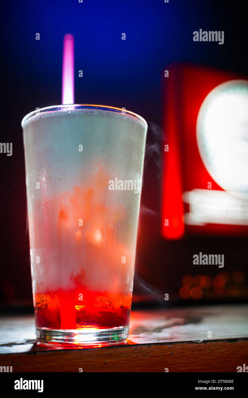 Freezing blue red cocktail glass hi-res stock photography and images ...