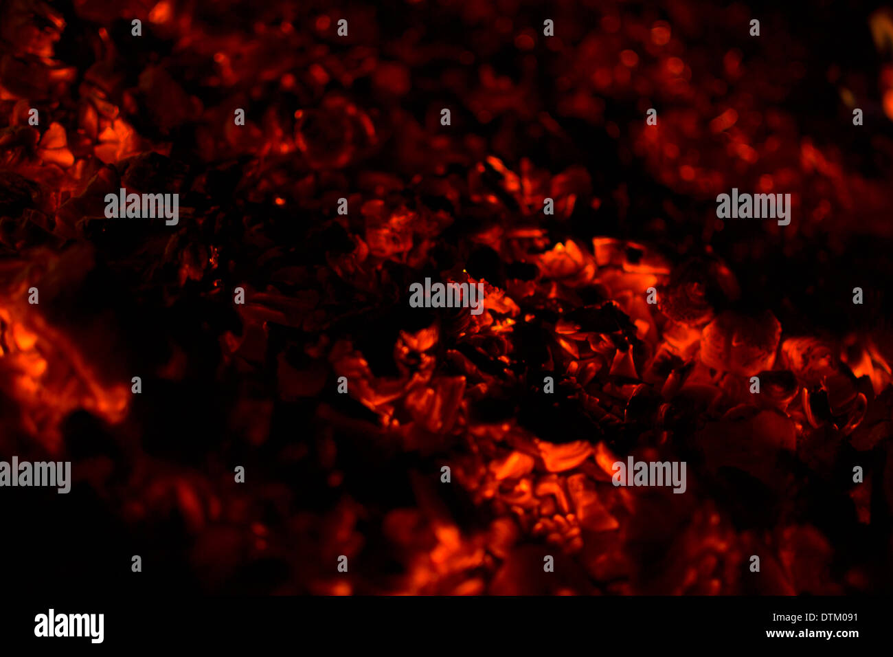 small glowing red and black charcoal closeup Stock Photo - Alamy