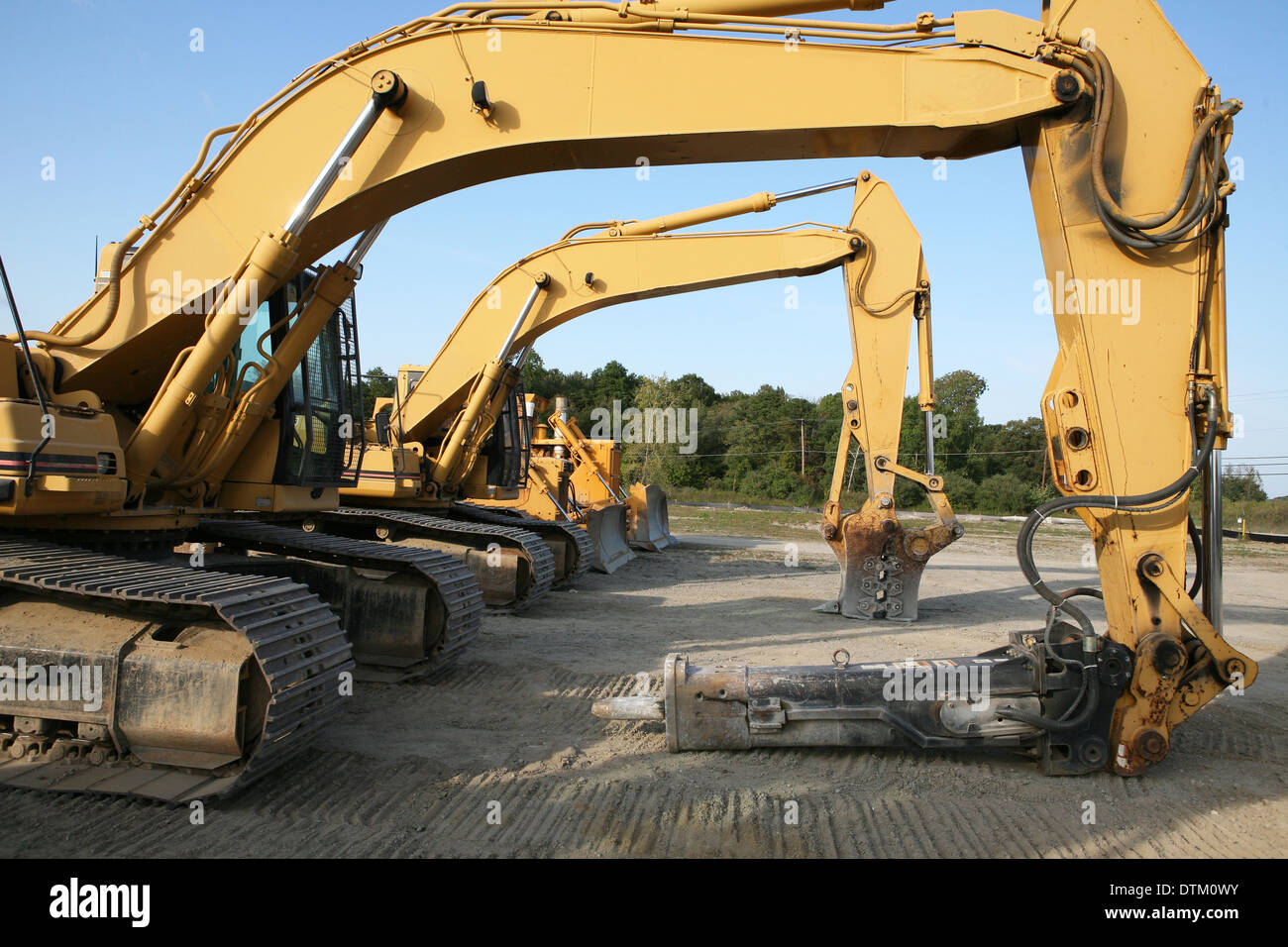 Lineup of Construction Vehicles At Construction Site Stock Photo - Alamy