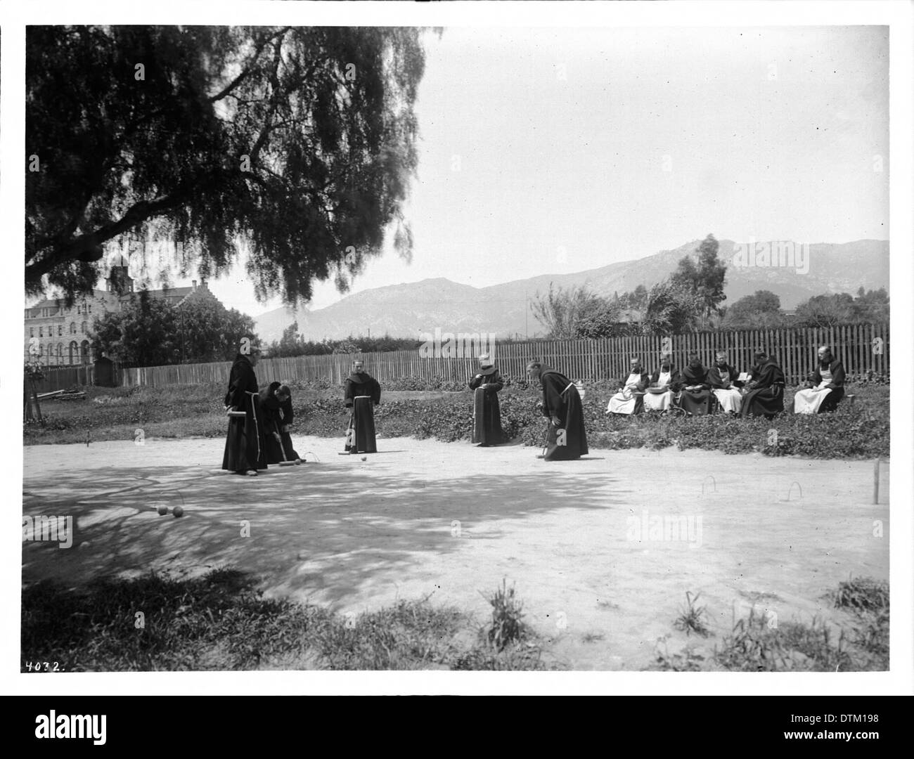 Six Franciscan monks are seen observing as five other monks play ...