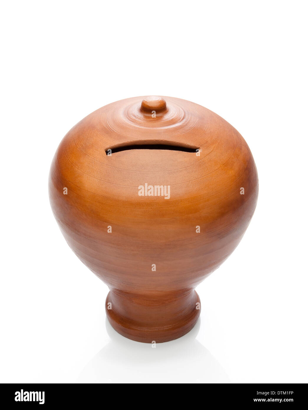 Traditional handmade clay money box. Clipping path Stock Photo - Alamy