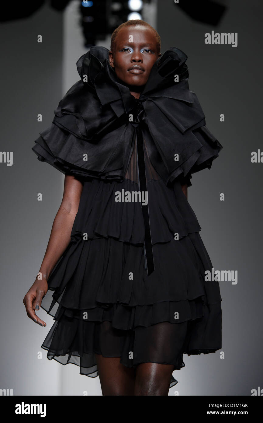 A model wears a design created by John Rocha during London Fashion Week ...