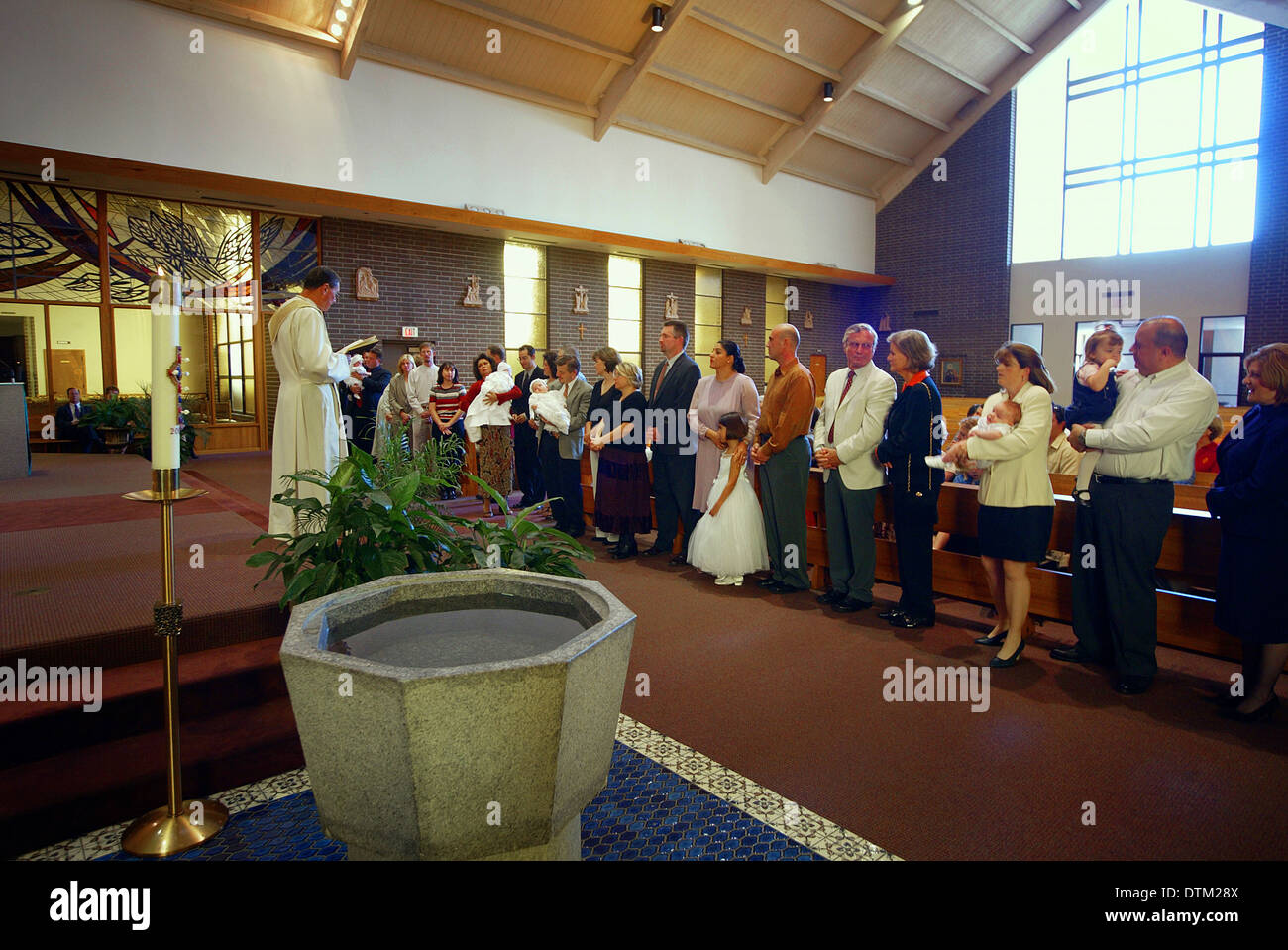 Priest reads to children hi-res stock photography and images - Alamy