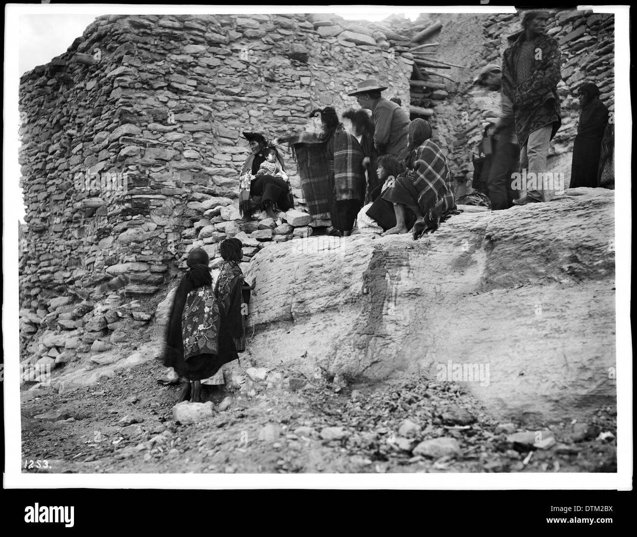 A photograph of spectators at the Hopi Indian village of Mishongnovi ...