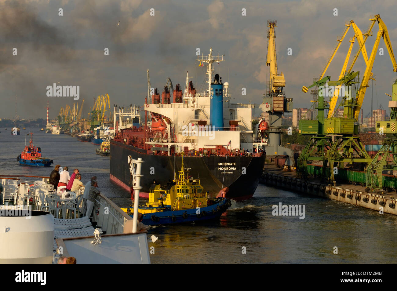 A cruise ship passing St Petersburg industrial docks. Russia Stock ...
