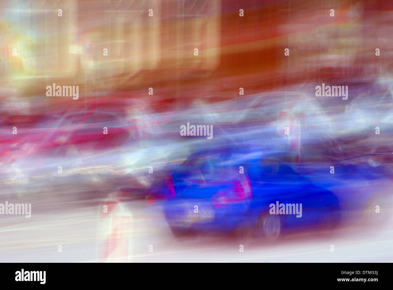 Red car in motion hi-res stock photography and images - Alamy