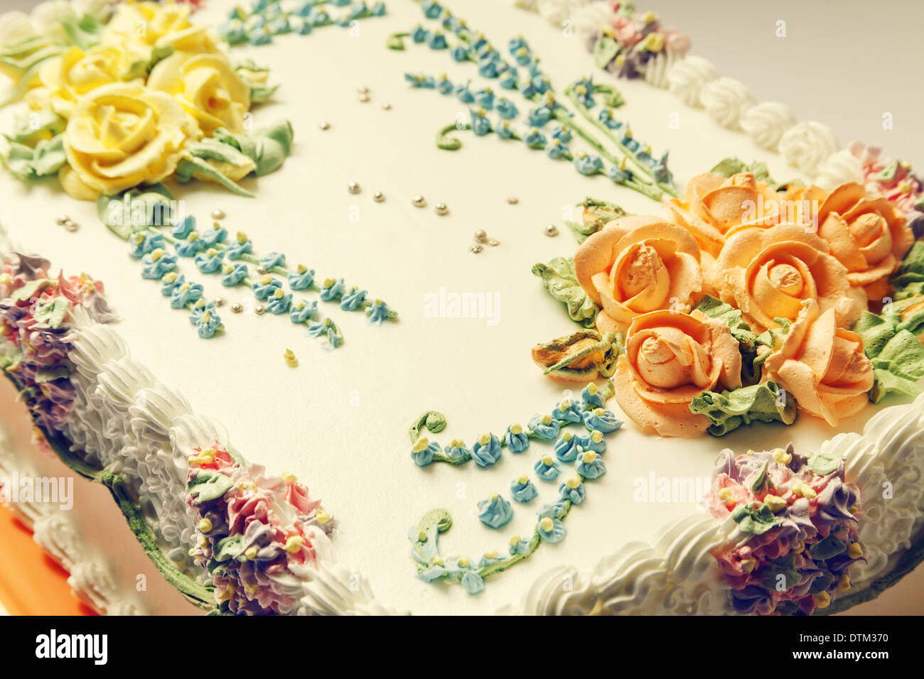 Classical birthday cake design with a lot of flowers of cream Stock ...