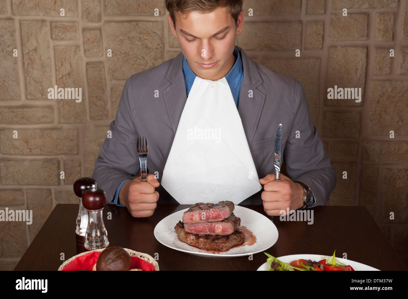 eat a beef steak Stock Photo - Alamy