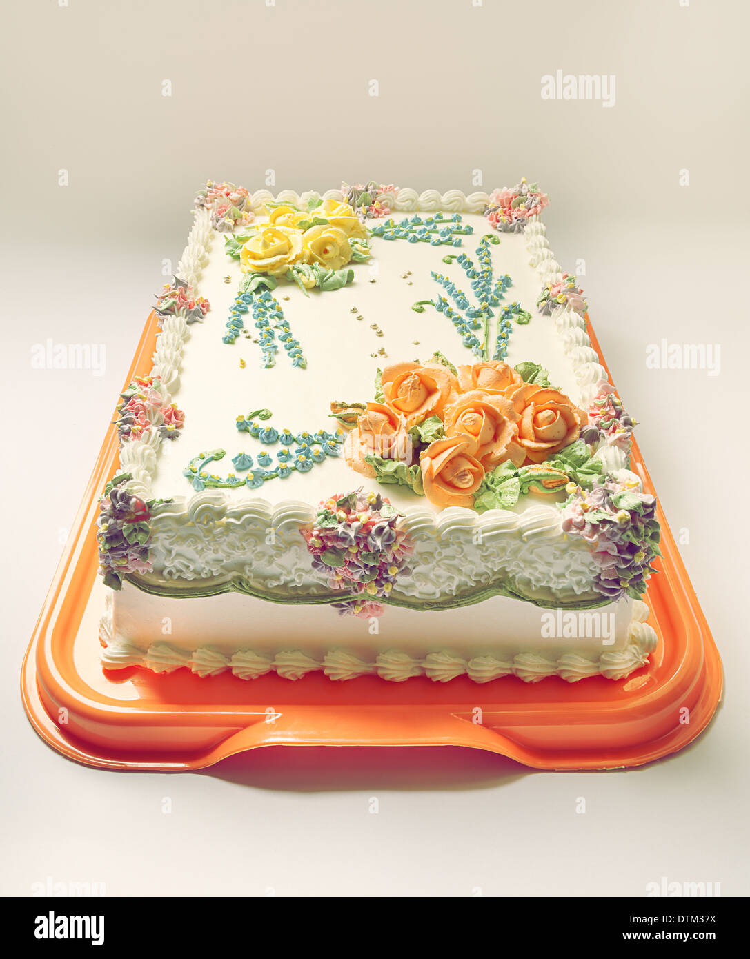 Classical birthday cake design with a lot of flowers of cream Stock ...