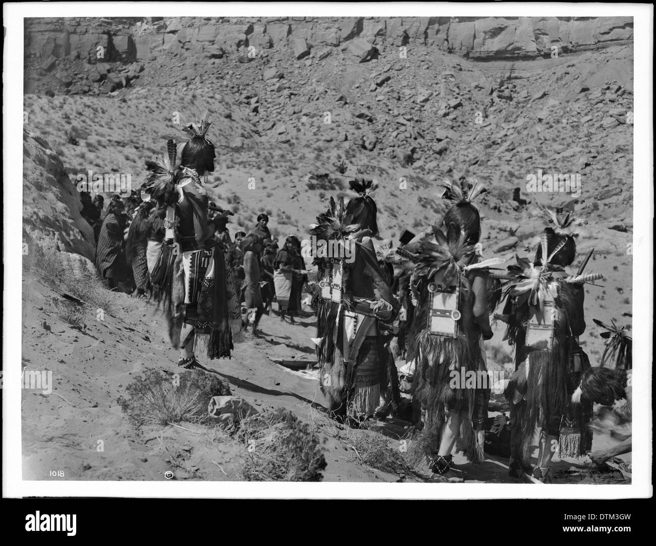 Four costumed dancers, the flute players, participating in the Hopi ...