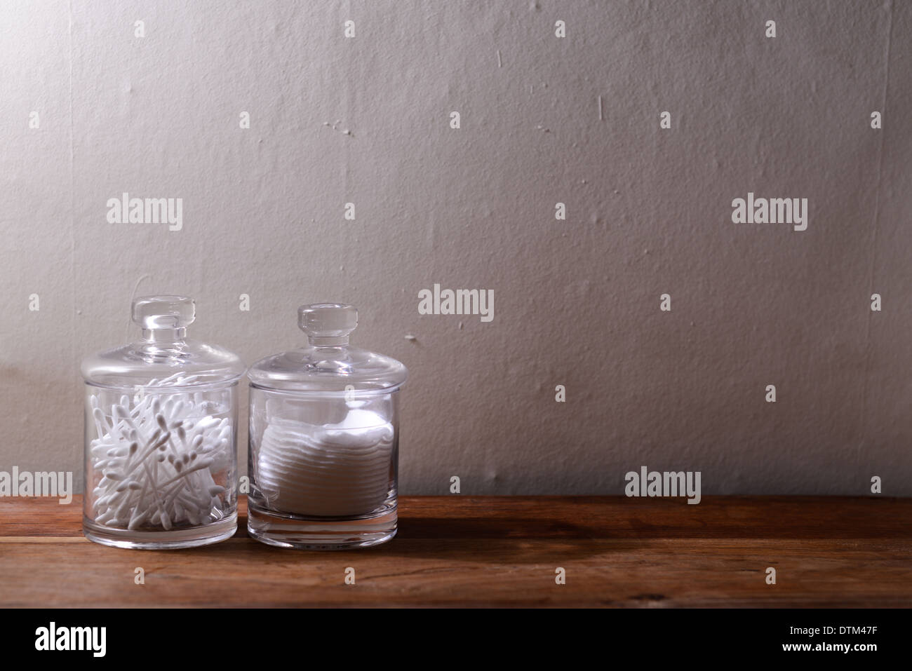 Two glass jars with cotton wool products Stock Photo - Alamy