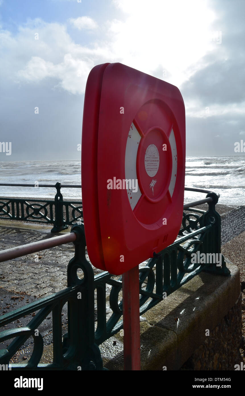 Safety ring on seafront Stock Photo - Alamy
