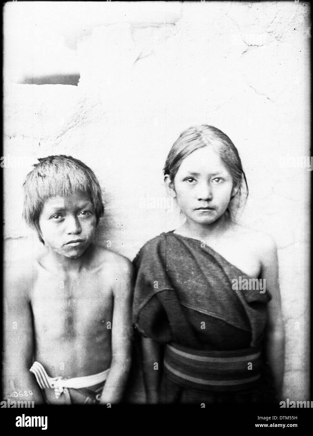 Two Hopi Indian children standing outdoors in 1903, wearing traditional ...