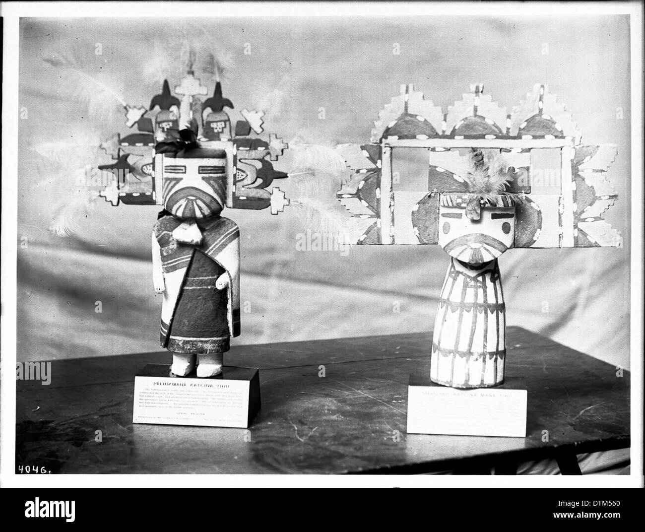 A photograph showcasing two Hopi Indian kachina dolls, one male and one ...