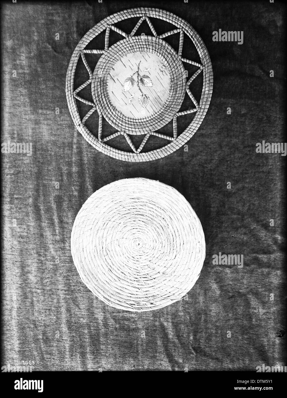 Two unidentified Indian baskets displayed, photographed around 1900 ...