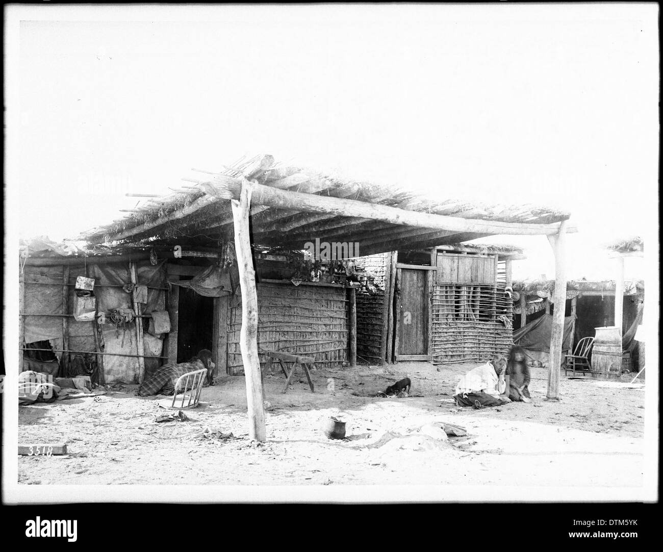 A photograph showing two women and a child in front of a Yuma Indian ...