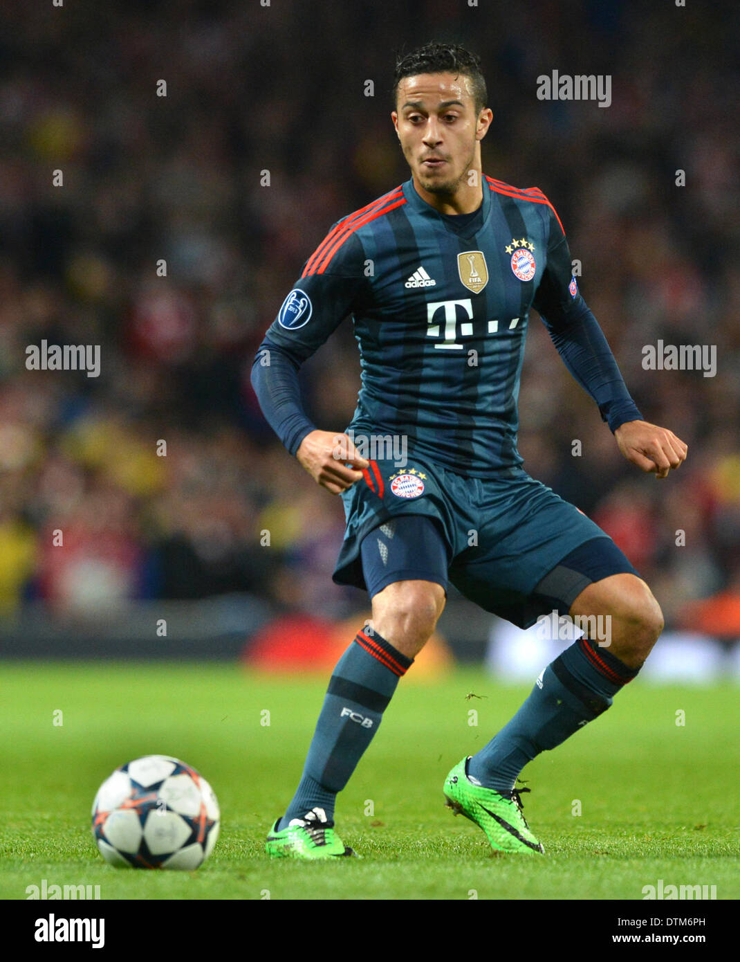 the Emirates Stadion, London. 19th Feb, 2014. Munich's Thiago Alcantara ...