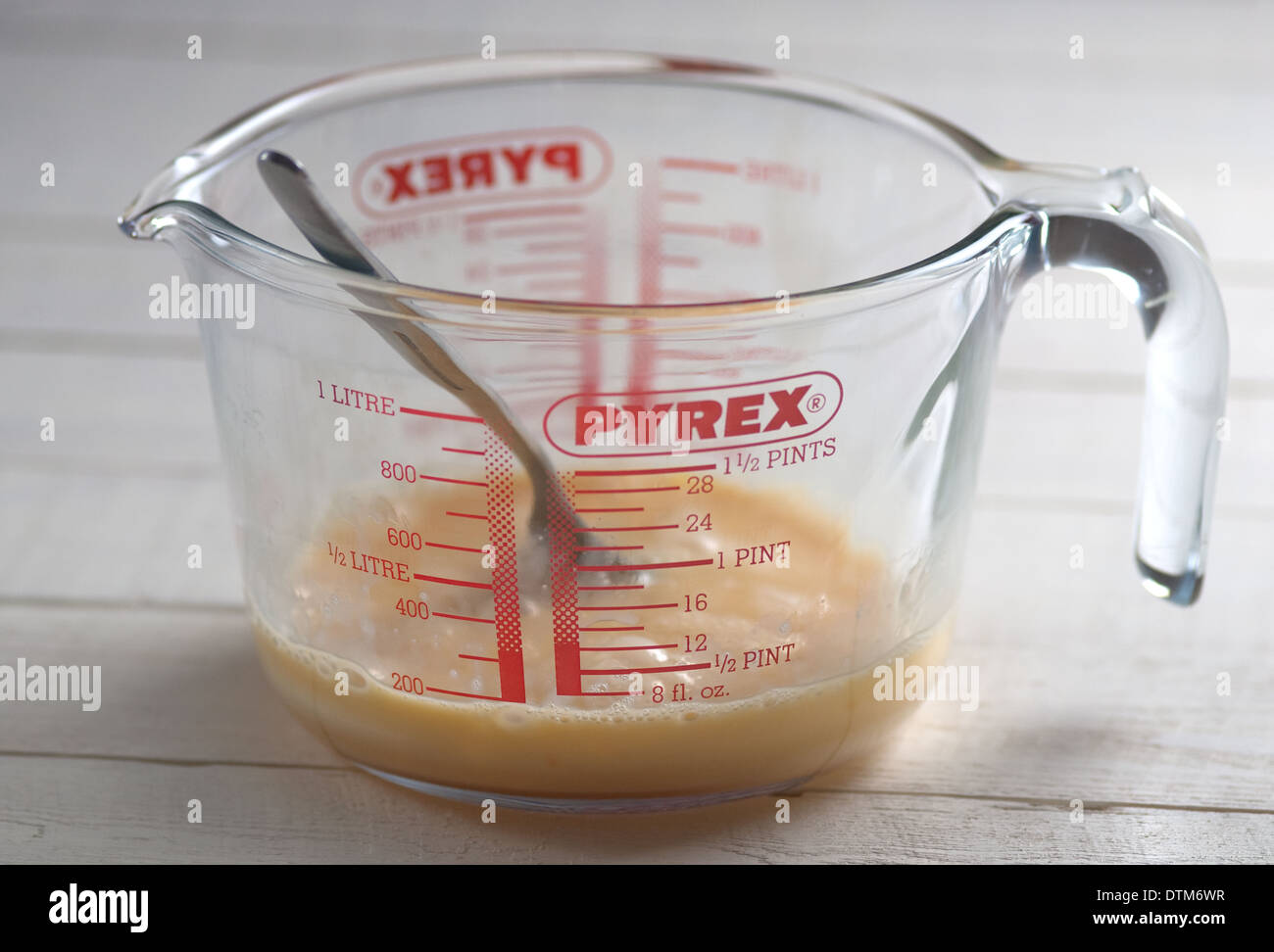 Still life food image of a Pyrex jug containing beaten eggs Stock Photo ...