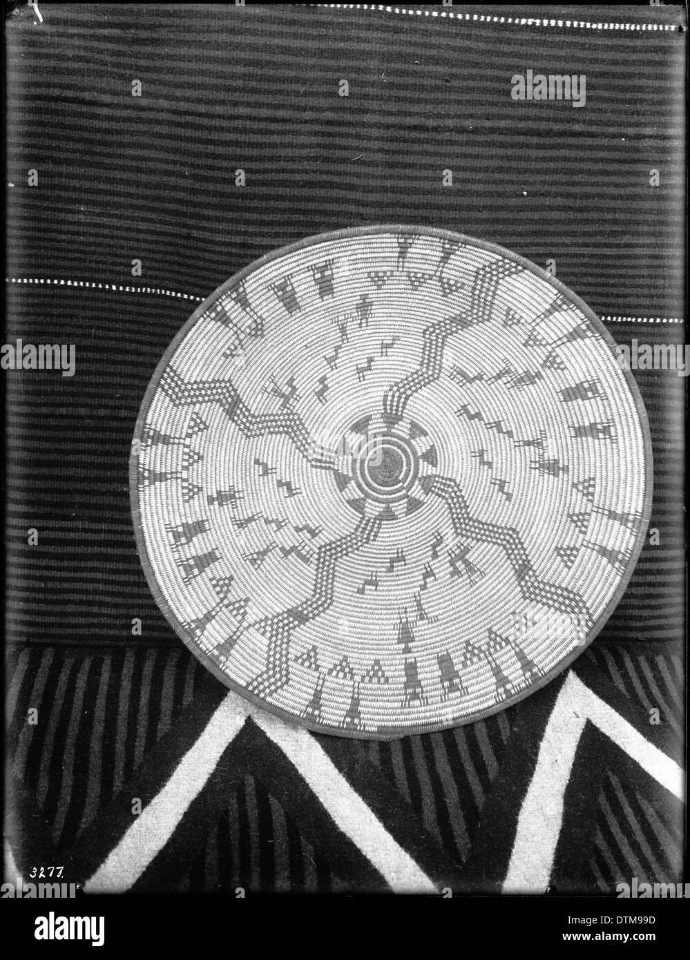 A Walapai Indian basket is displayed in a vintage photograph from ...