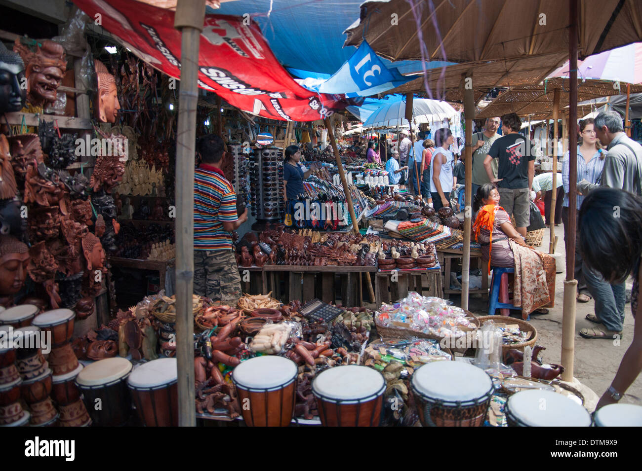 Ubud market full of colorful stalls and tourists in Bali, Indonesia ...