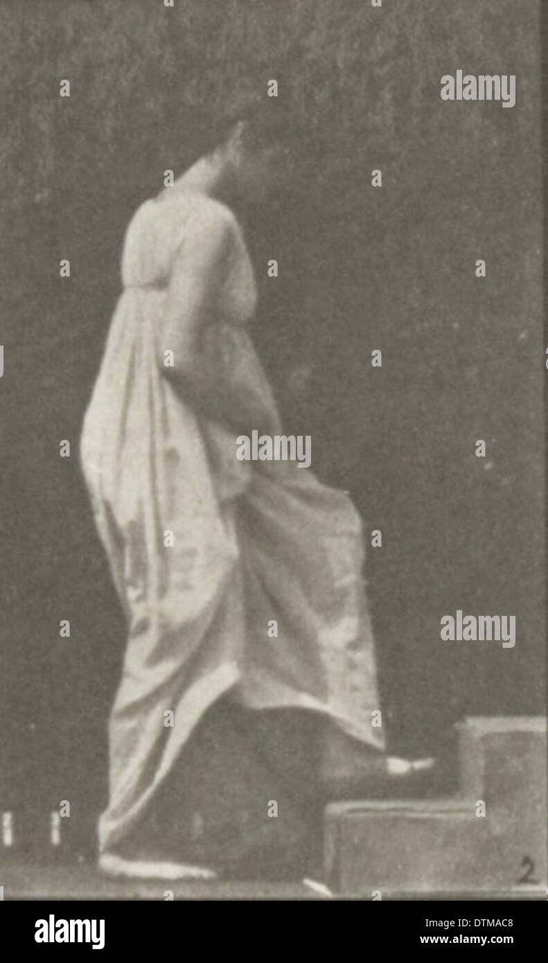 A woman is depicted climbing stairs, captured in a natural or staged ...