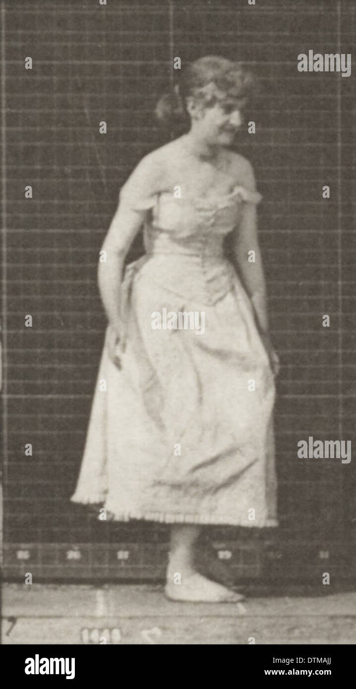 A photograph of a woman in a long dress performing a curtsey, kissing ...