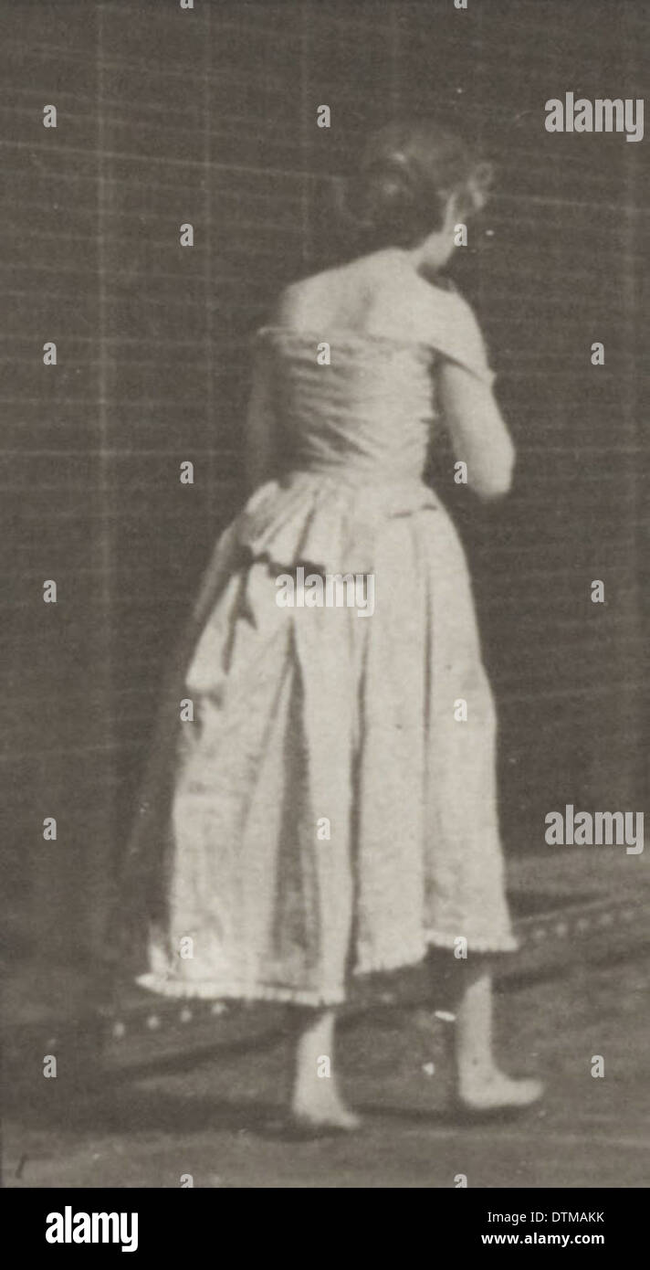 A photograph of a woman in a long dress, curtseying, kissing her hand ...