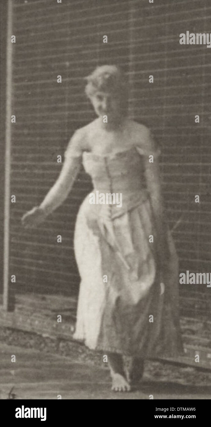 A photograph of a woman in a long dress curtseying, kissing her hand ...