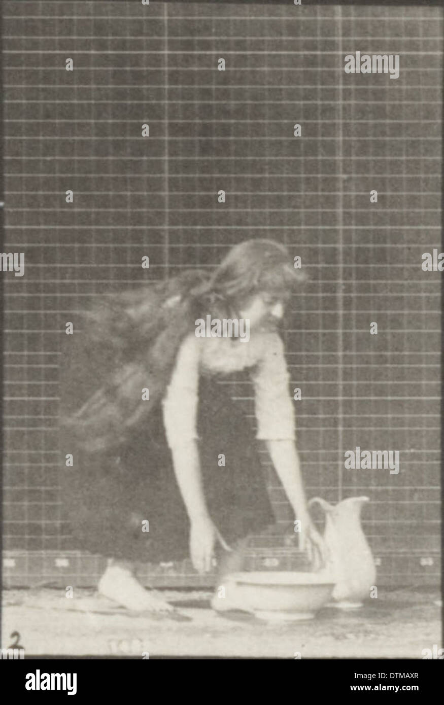 Woman in long dress lifting hi-res stock photography and images - Alamy