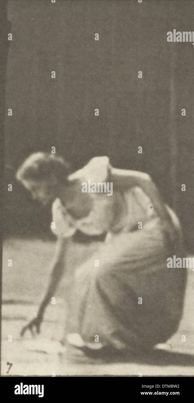 A woman in a long dress is depicted stooping and lifting a handkerchief ...